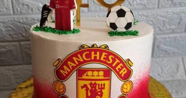 We deliver Manchester United themed logo cream egg-less cakes across ...